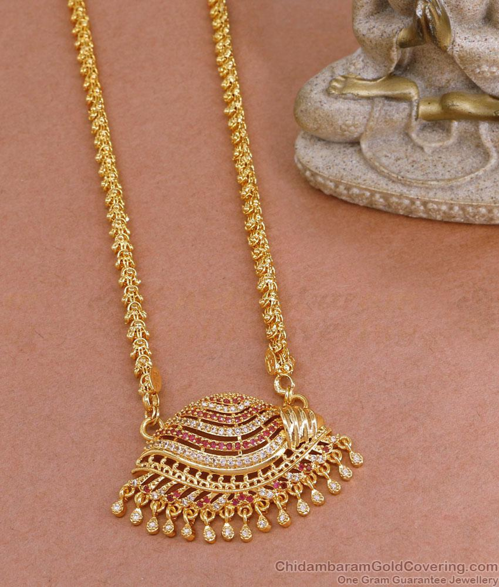Sparkling Ruby White Stone Vishnu Sangu Dollar With Jasmine Gold Chain ...