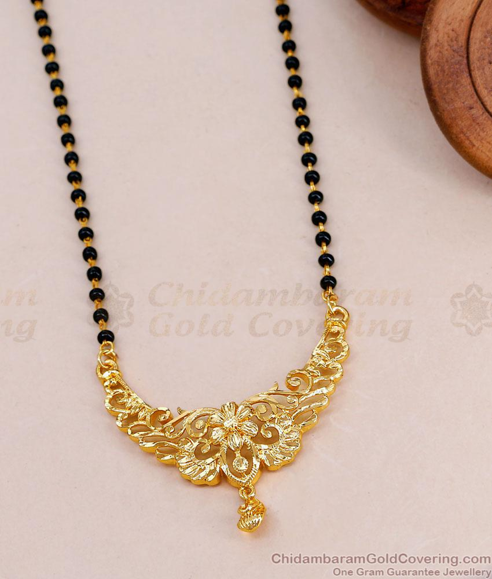 Latest Gold Imitation Karugamani Chain With Dollar For Married Women ...