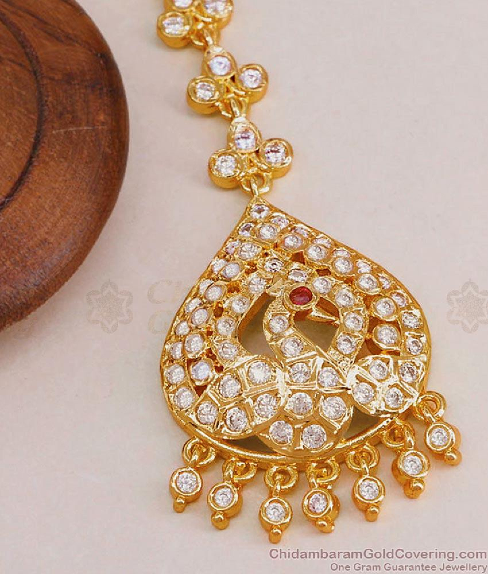 South Indian Nethichutti Peacock Design With Gati Stones NCHT411