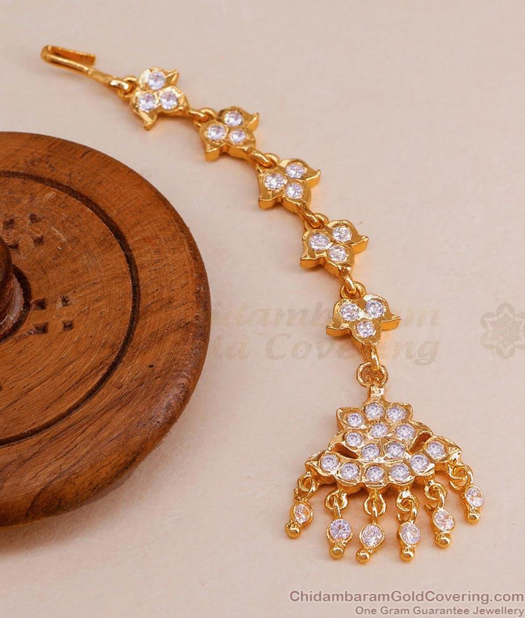 Full White Stone Impon Panchaloha Nethichutti Designs For Women NCHT413