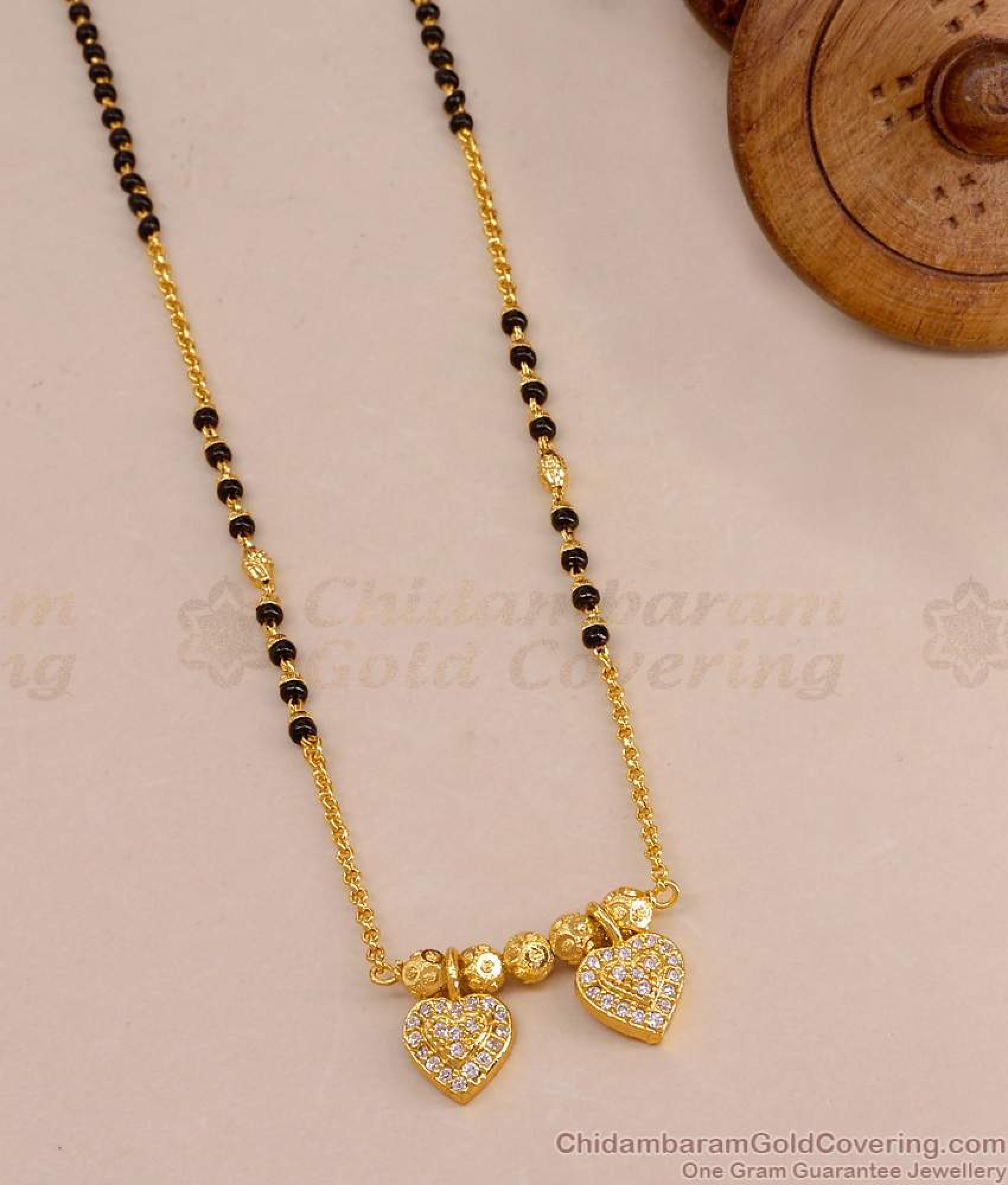 Stylish White Stone Heart Shaped Gold Mangalsutra Thali Chain With ...